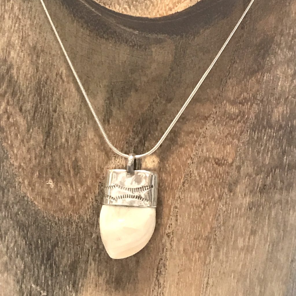 We create custom jewelry from our Elk Ivories or yours. - Elk Ivory Jeweler