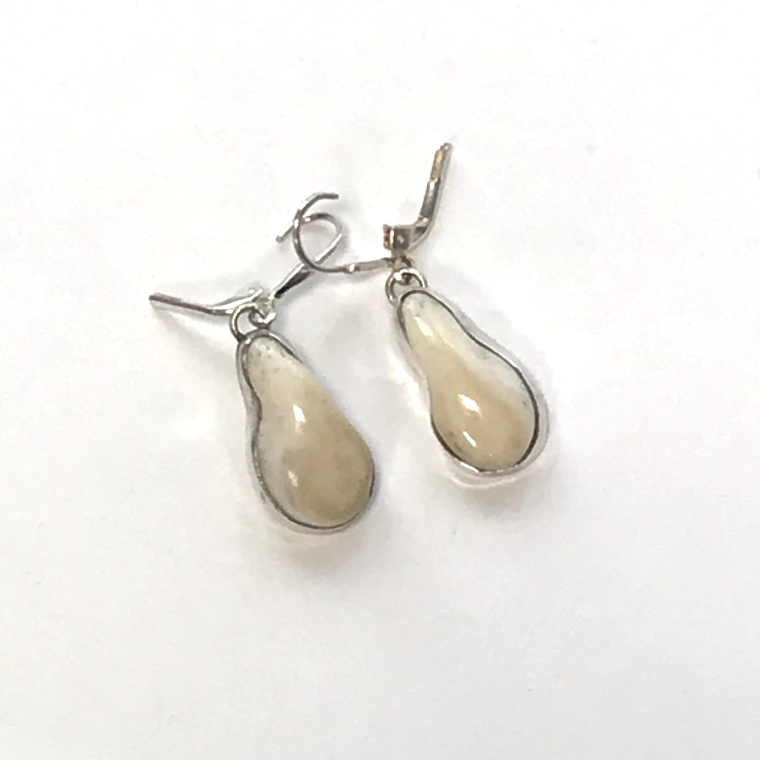 We create custom jewelry from our Elk Ivories or yours. - Elk Ivory Jeweler